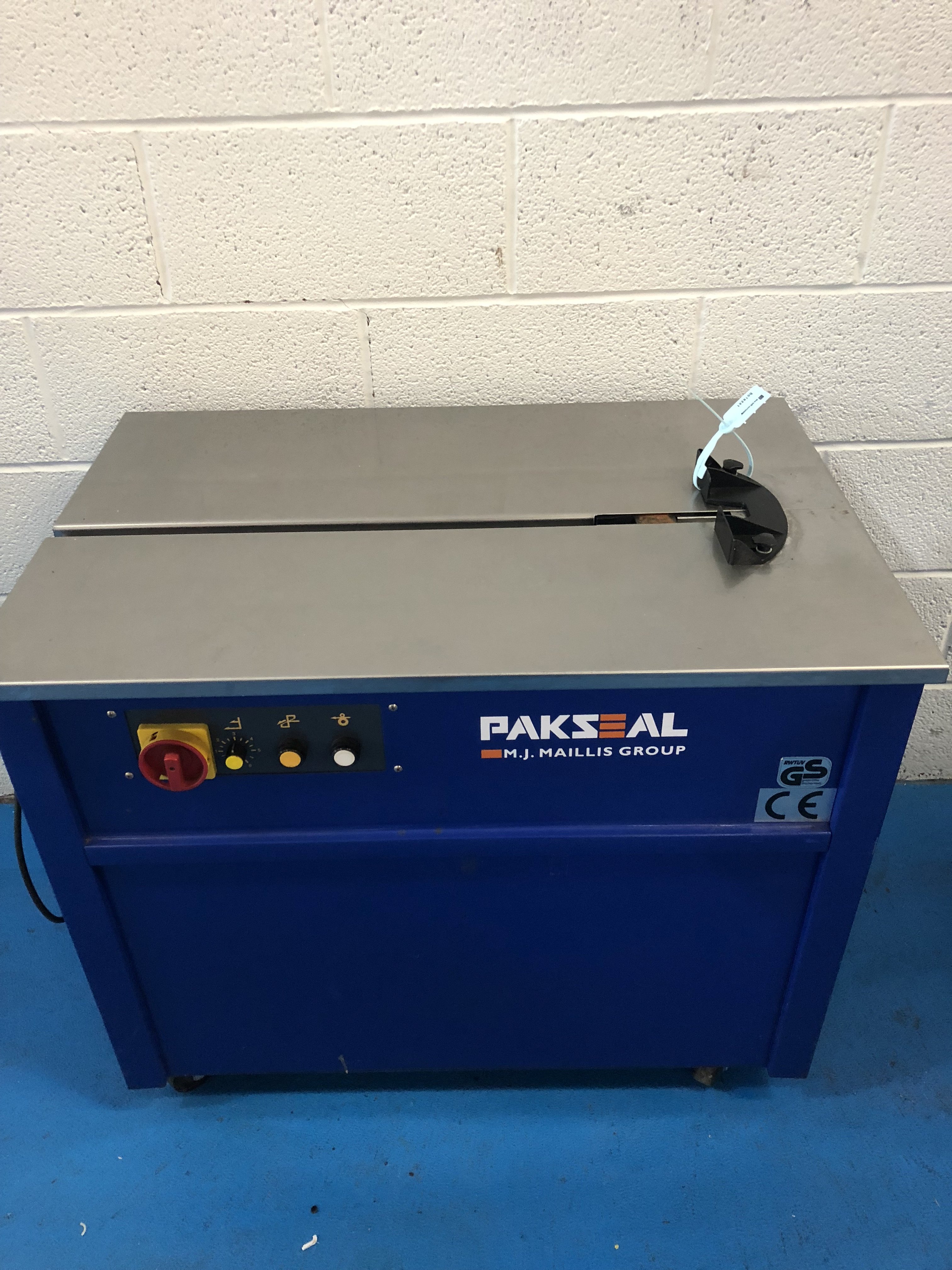 Packseal band strapping machine